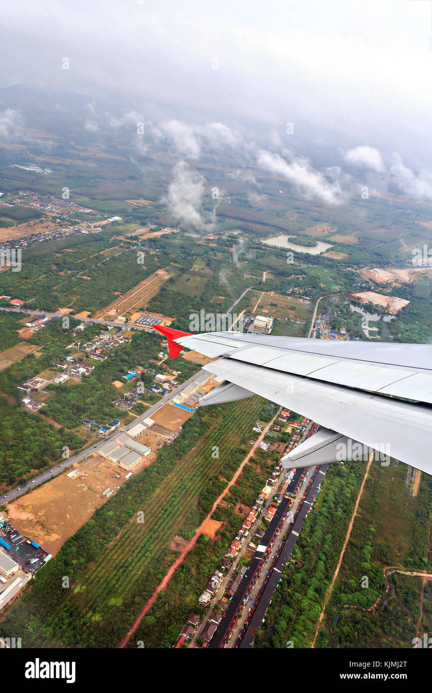 View of the city from plane window, selective focus Stock Photo - Alamy