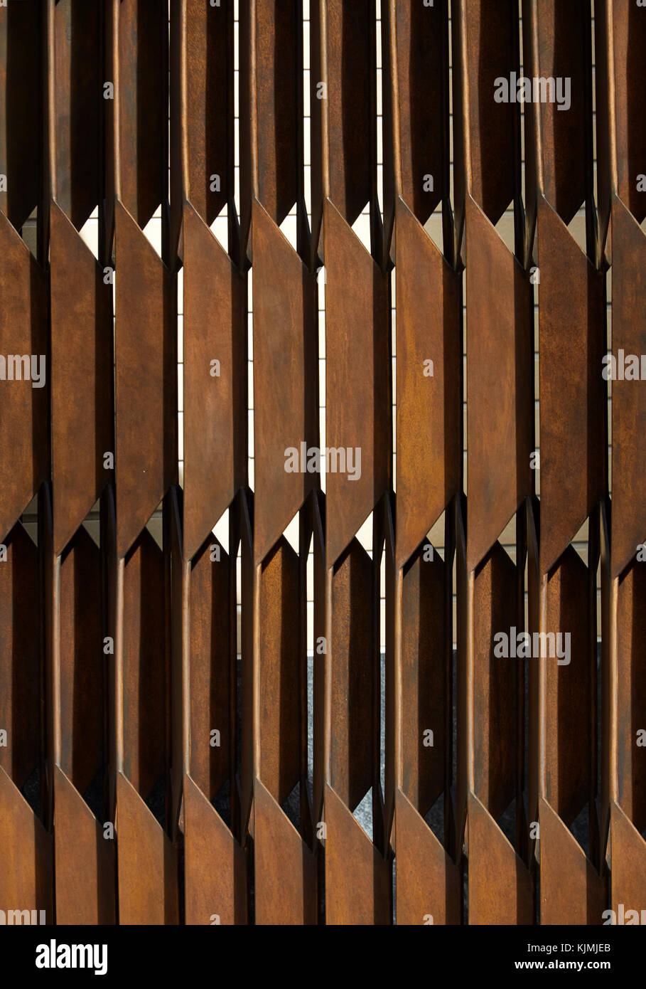 Detail of cor-ten steel entrance gate. Rathbone Square, London, United ...