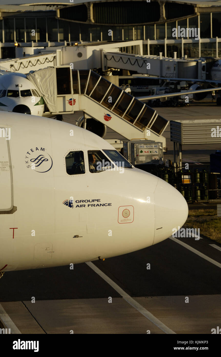 co-pilot visible through the windshields, taxiing across and airside ...