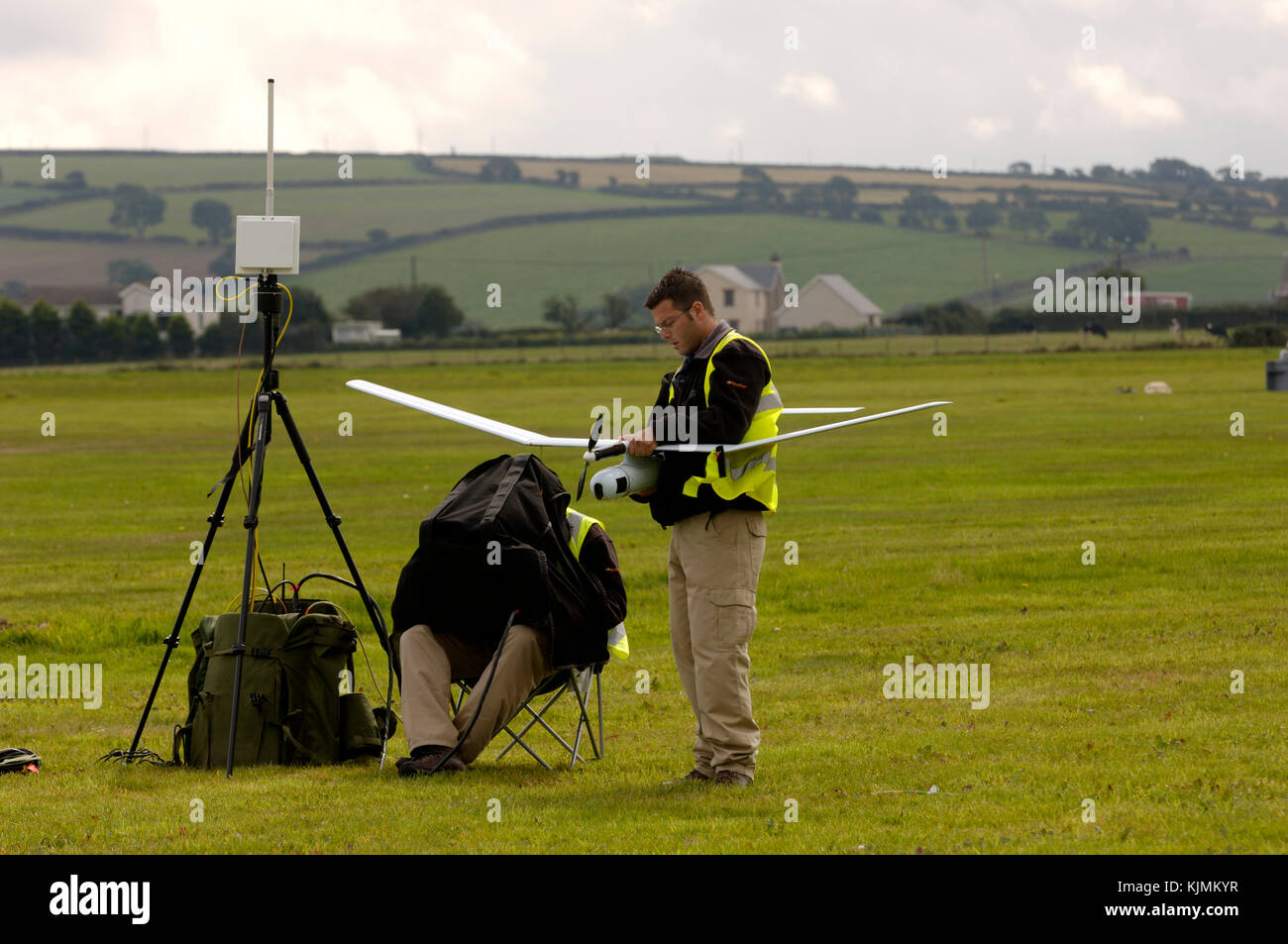 engineer about to launch the Skylark UAV with the pilot under the hood ...
