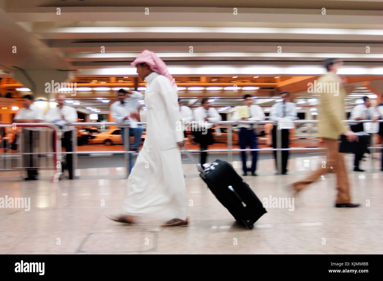 men greeters and friends waiting in the Terminal1 arrivals greeters ...