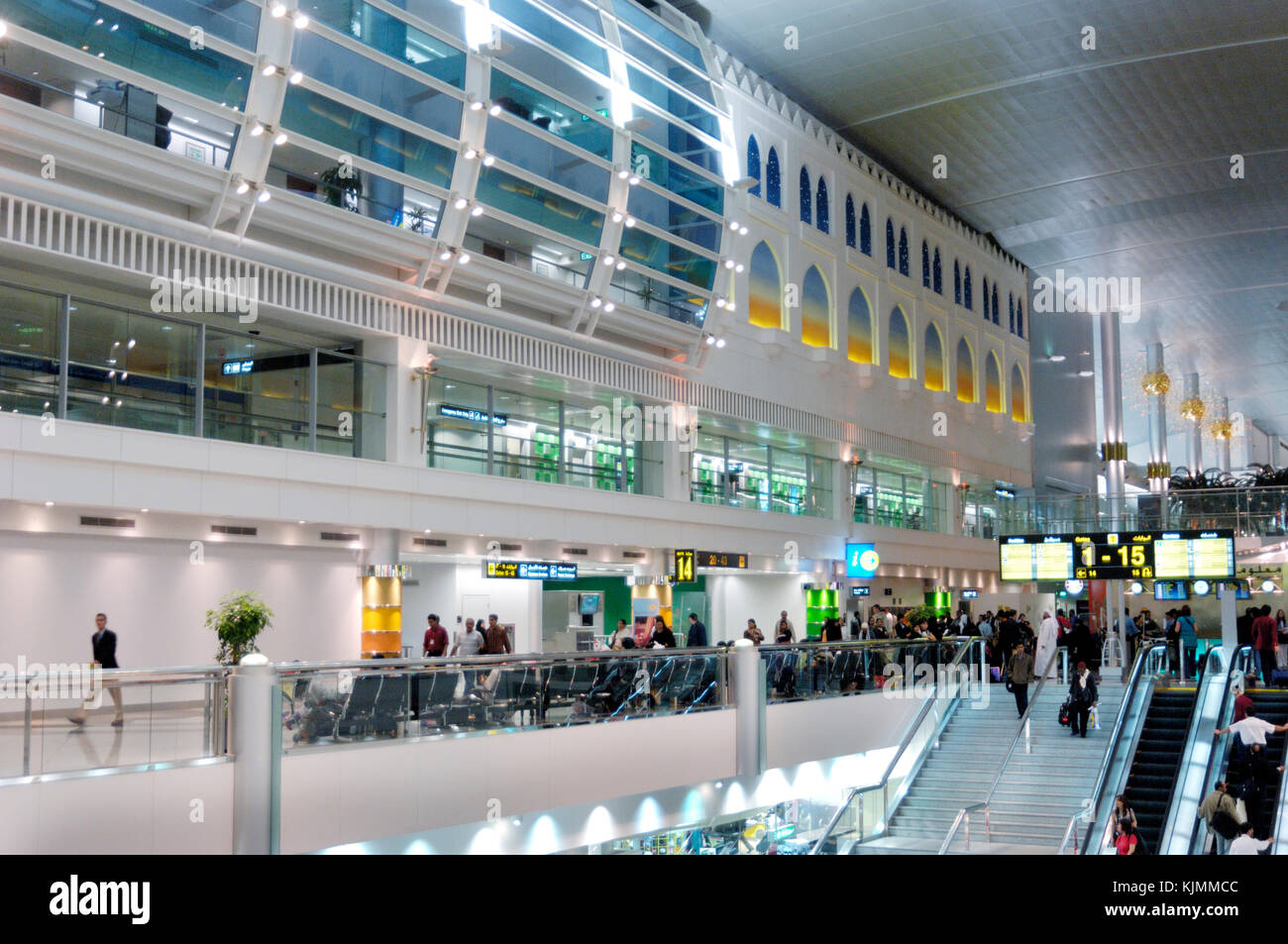 passengers near the Sheikh Rashid Terminal duty-free shopping area and ...
