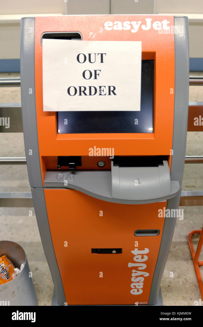 an easyJet selfservice check-in kiosk with an 'out of order' sign Stock ...