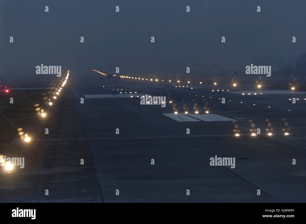 runway and lights in fog at night Stock Photo - Alamy