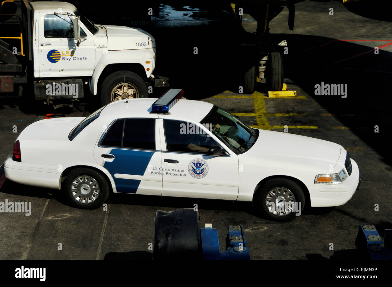 US Customs and Border Protection car with a LSG Sky Chef catering truck ...