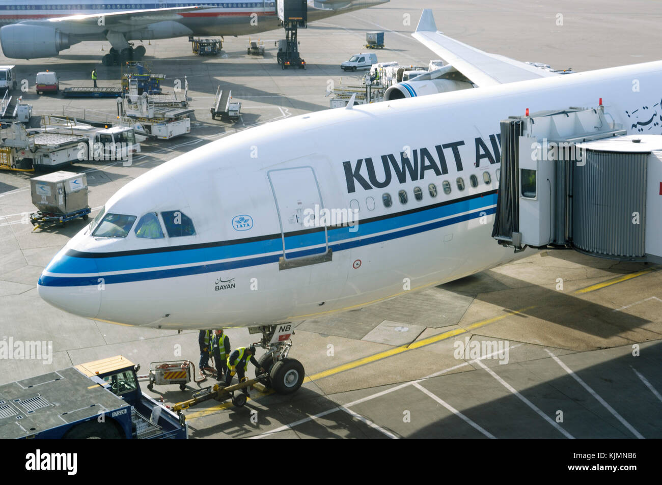 Kuwait Airways Airbus A340-300 parked at the gate at Terminal3 waiting ...