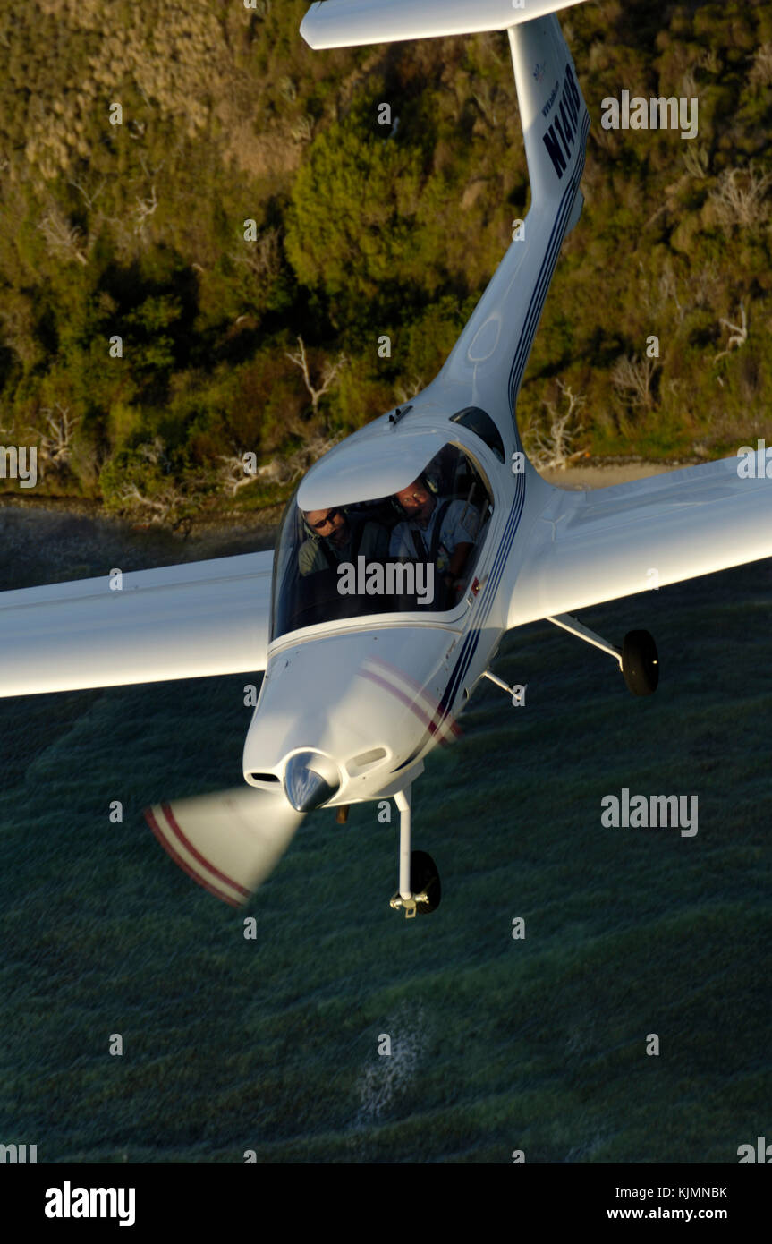 a Diamond DA-20-C1 Eclipse flying over the Saint Croix, USA USVI ...