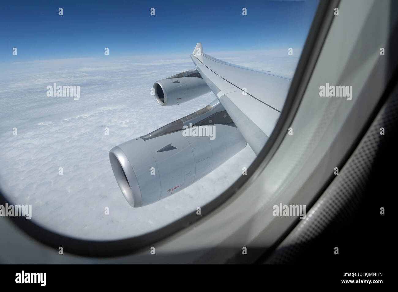 window with CFM56-5C2 engine cowlings and the wing on the Lufthansa ...