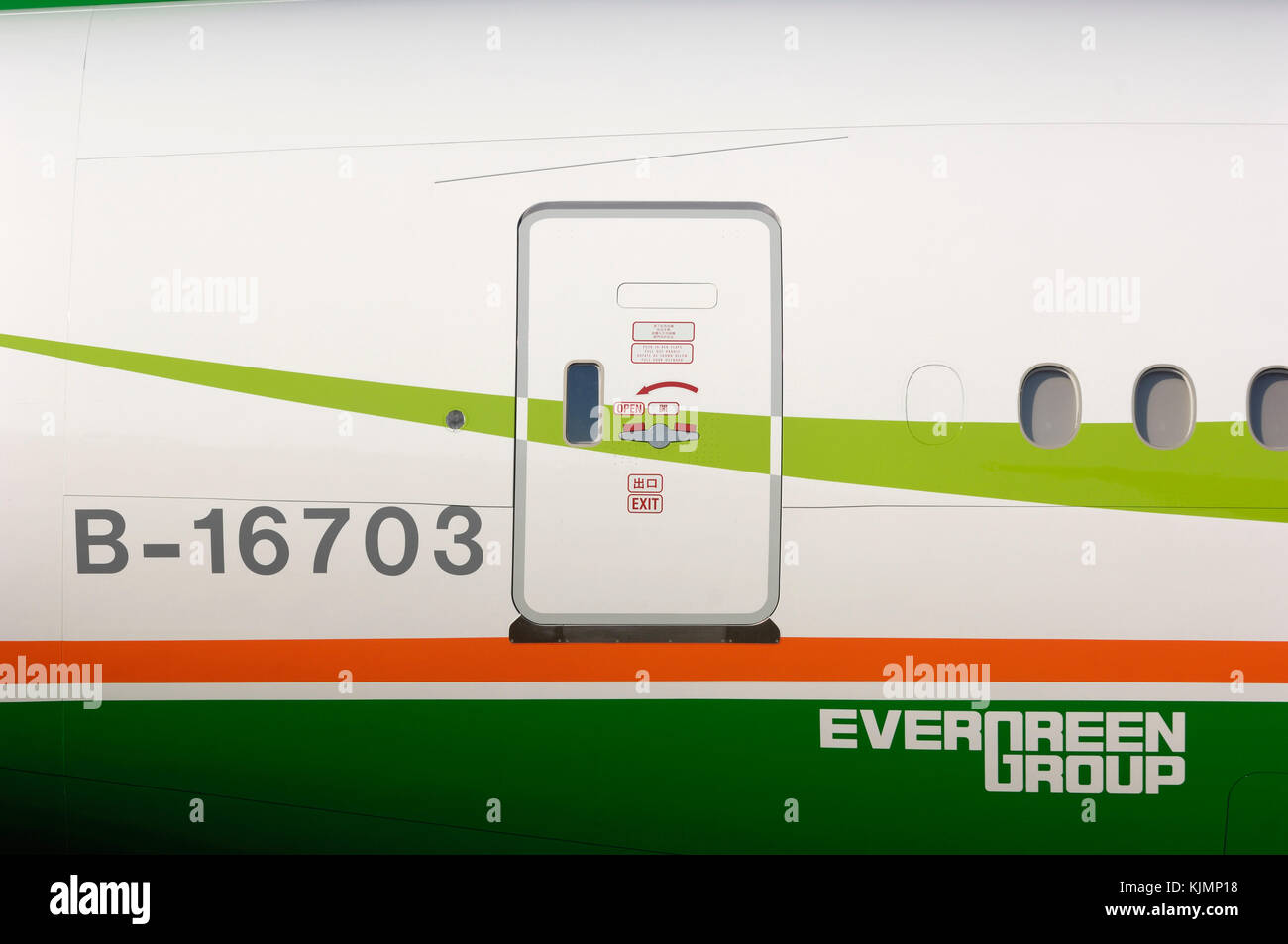 exit door and registration of the EVA Air Boeing 777-300ER parked in ...