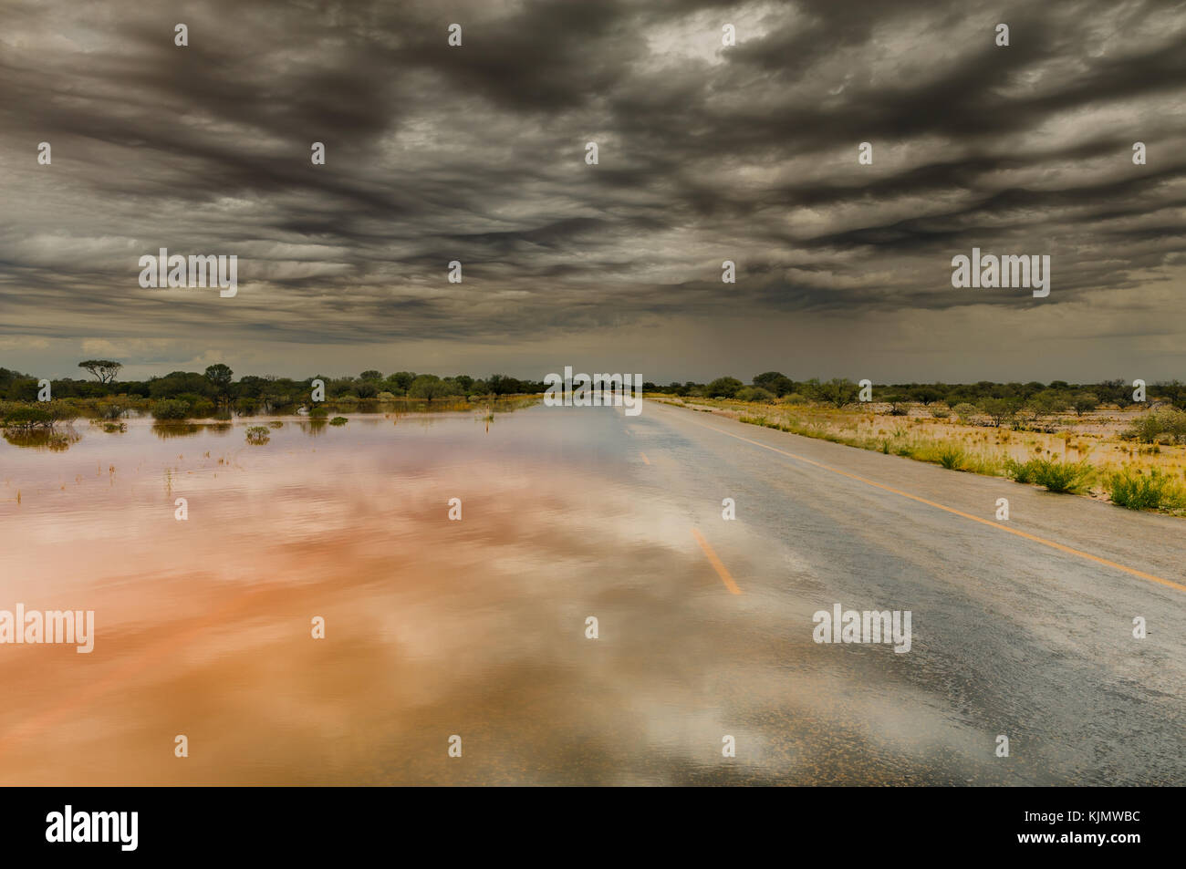 Water running over Great Northern Highway after heavy rain in Western ...
