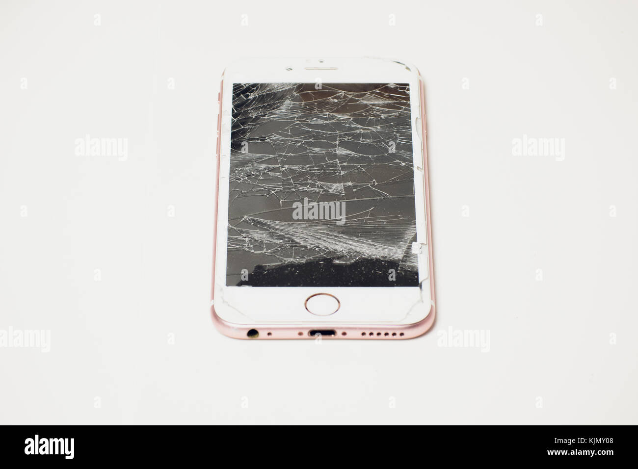 Modern mobile smartphone with broken screen isolated on white ...