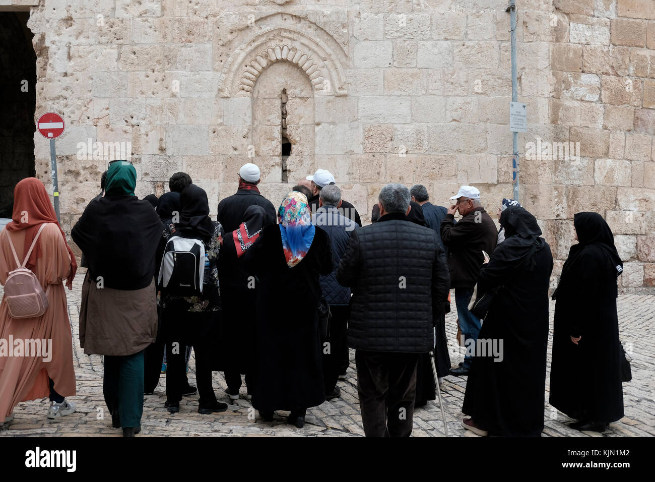 A group of Turkish tourists visiting the Old City of East Jerusalem ...