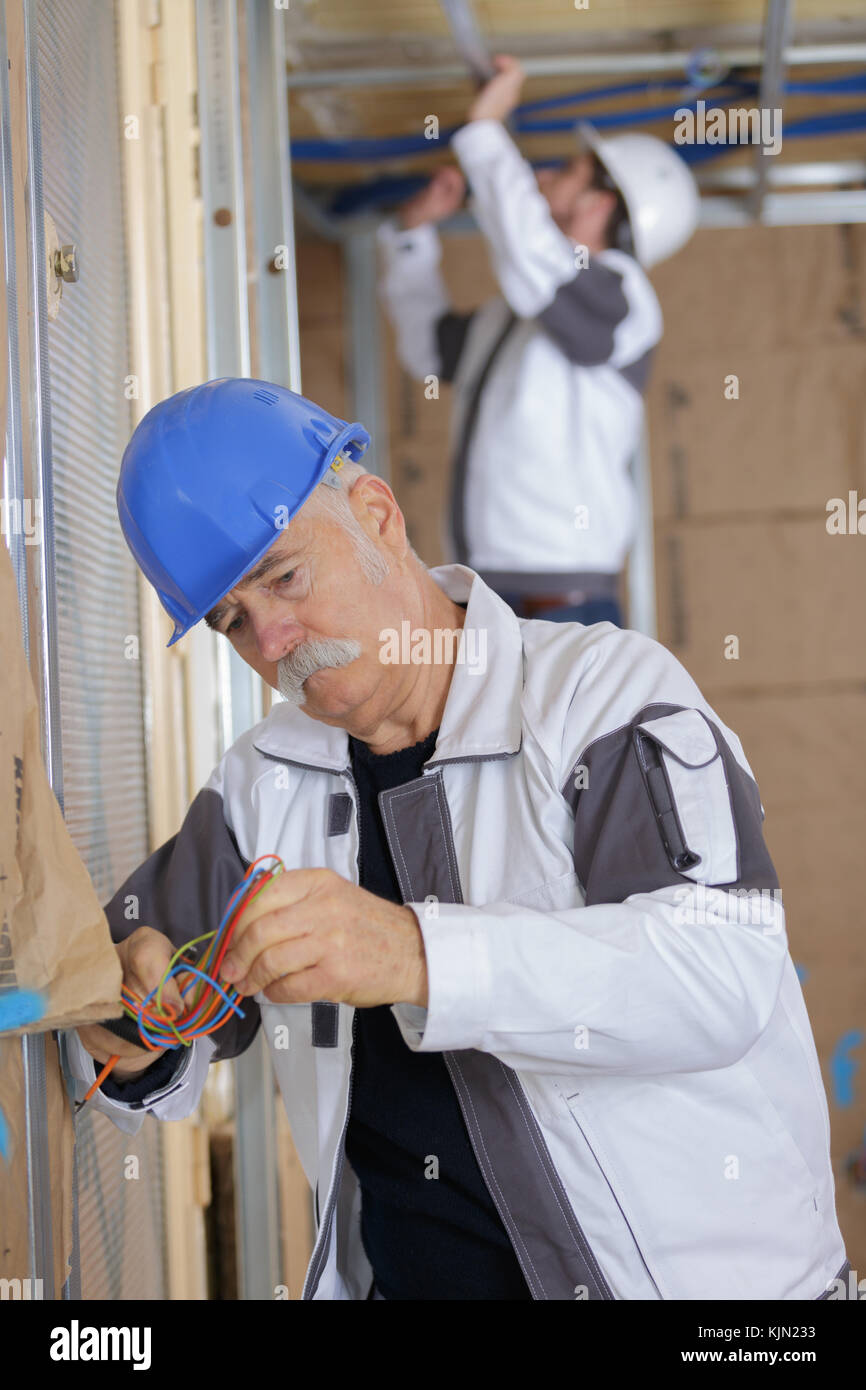 senior builder as craftsman with experience cooperating with foreman ...