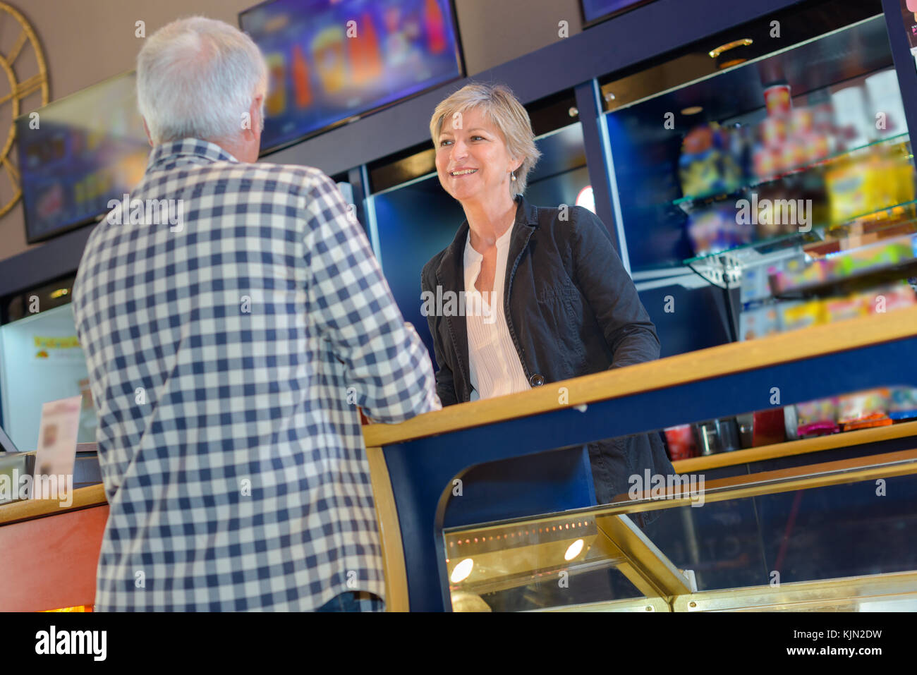 at the counter Stock Photo - Alamy