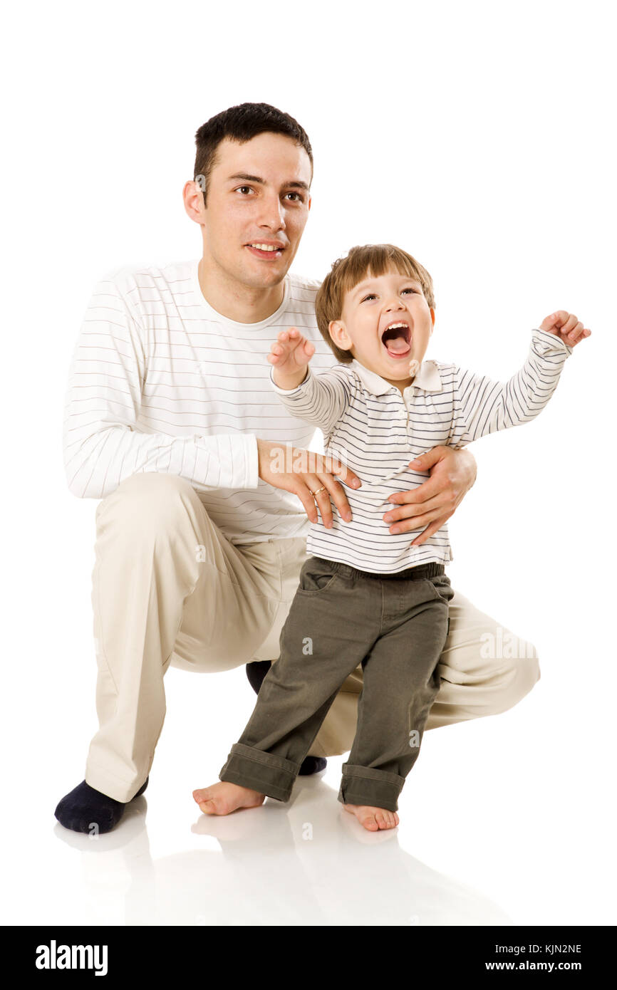 Happy Father holding son looking up isolated on white Stock Photo - Alamy