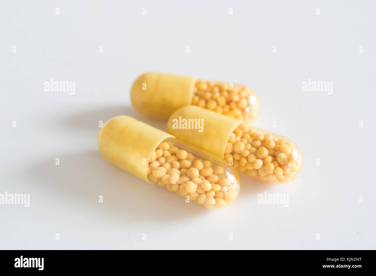 Aspirin pill yellow hi-res stock photography and images - Alamy
