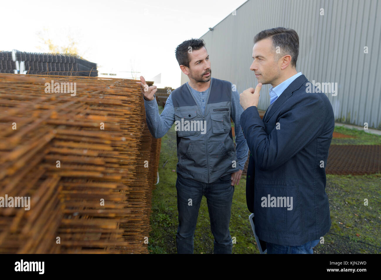 workers outside a factory Stock Photo - Alamy