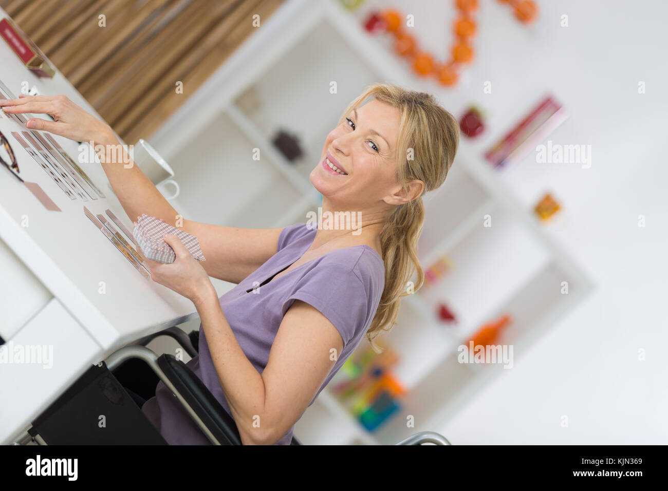 Disabled lady playing cards Stock Photo - Alamy