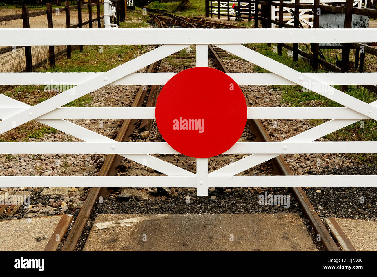 Railway Level Crossing Warning Symbol On Gate Stock Photo - Alamy
