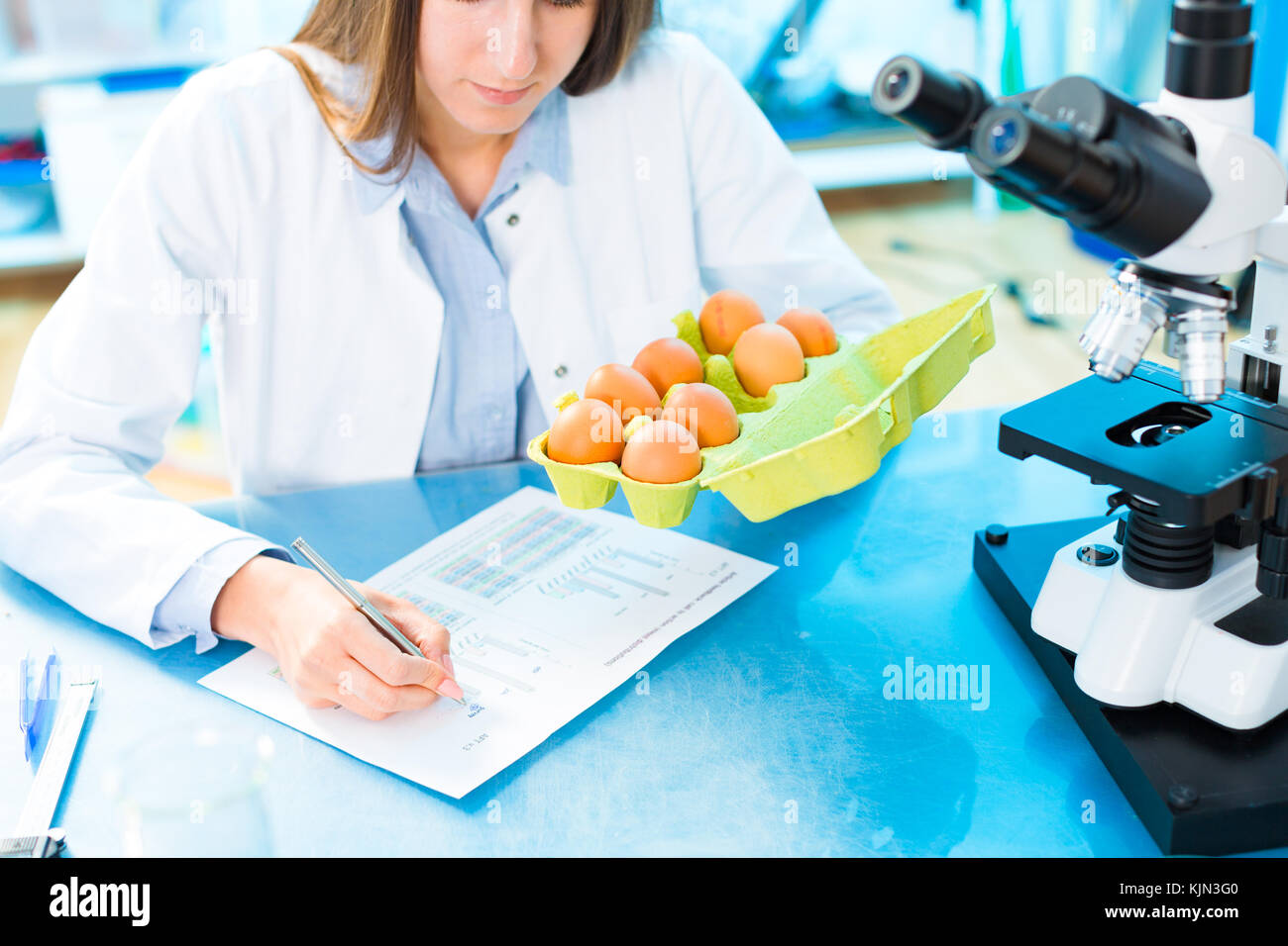 Eggs product research. Quality control processing foods Stock Photo - Alamy