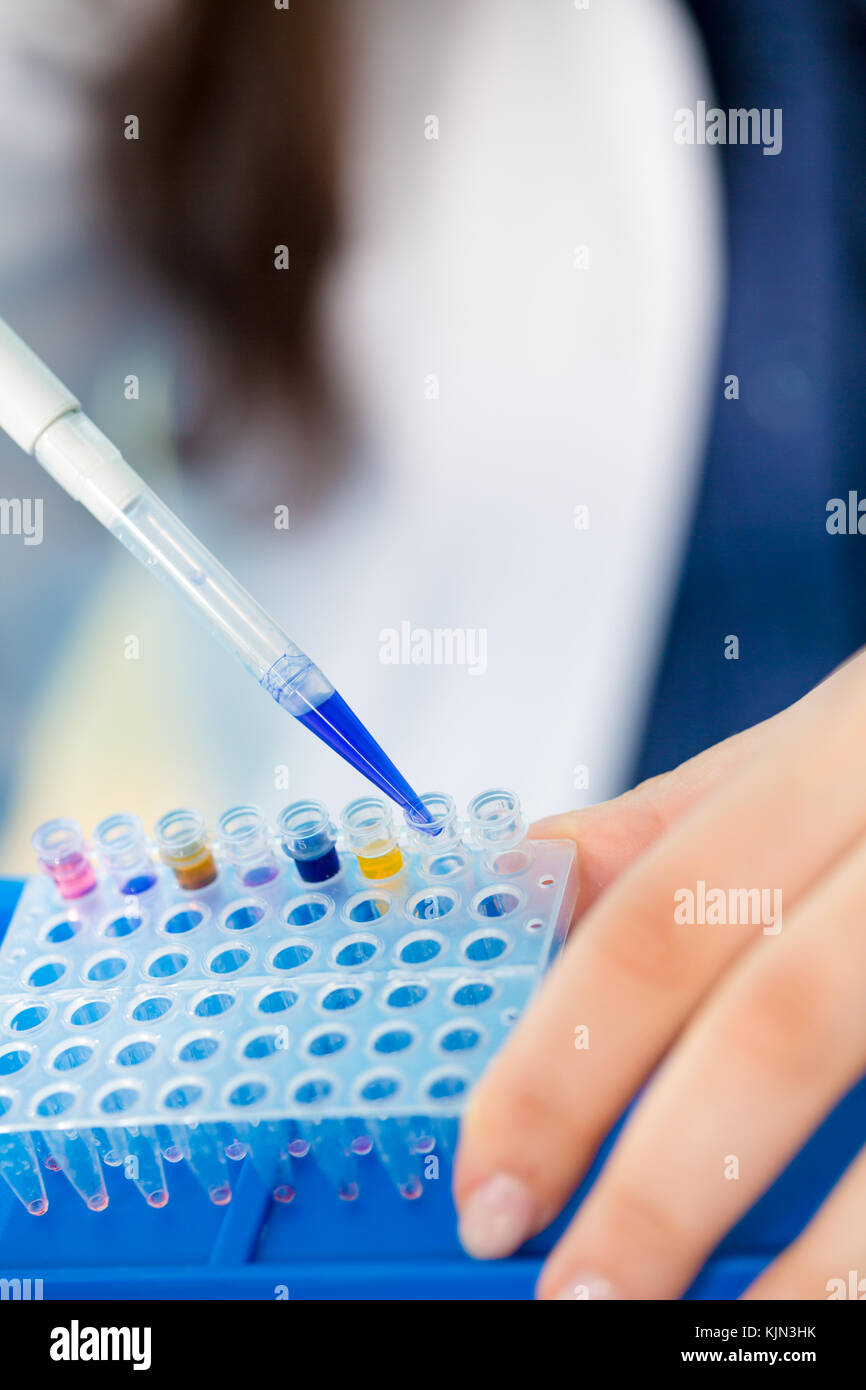 Young female technician in genetic laboratory with PCR Stock Photo - Alamy