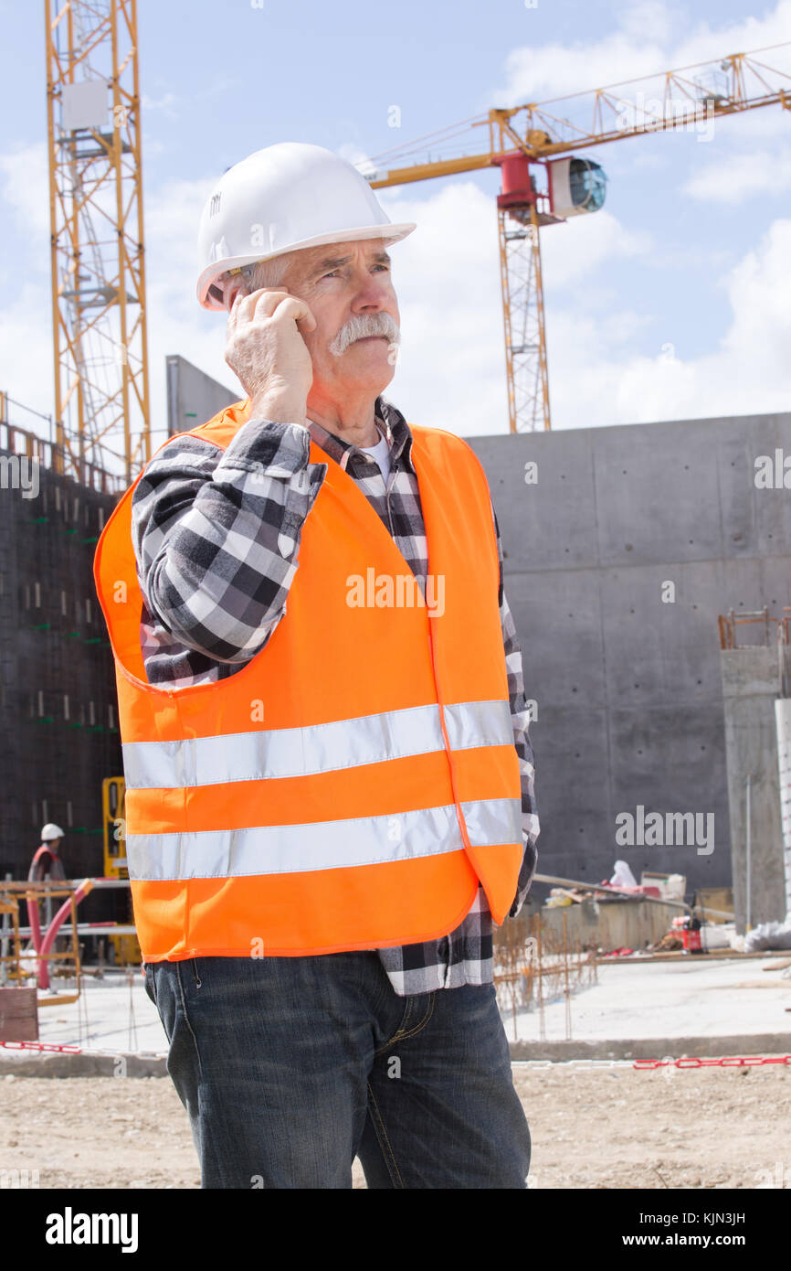 senior engineer builder outdoors at construction site Stock Photo - Alamy
