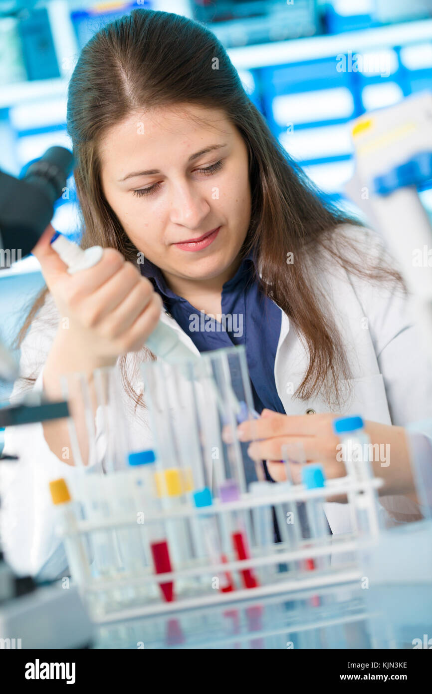 Young female technician in genetic laboratory with PCR Stock Photo - Alamy