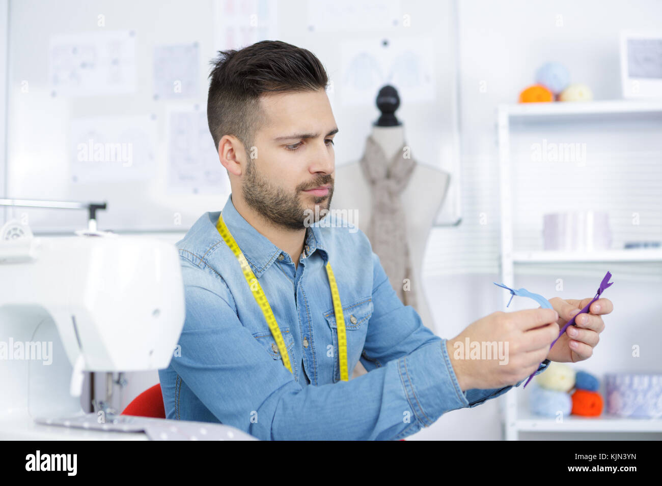 Tailor at work Stock Photo - Alamy