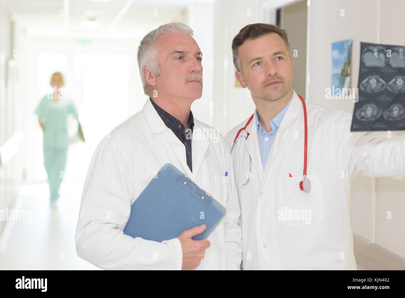 doctors examining the patient's examination result Stock Photo - Alamy