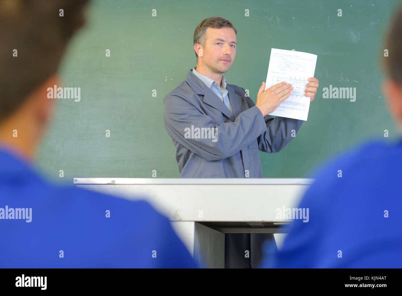 career teacher giving a course Stock Photo - Alamy