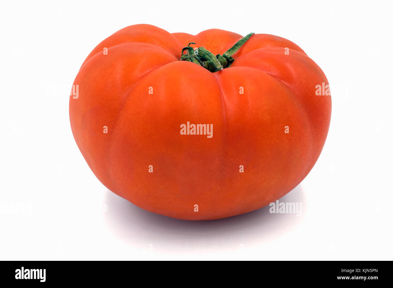 Big red Raf tomato from Almeria isolated on white background Stock ...