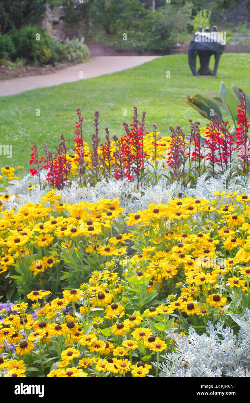 Garden with plenty of blooming Flowers Stock Photo - Alamy