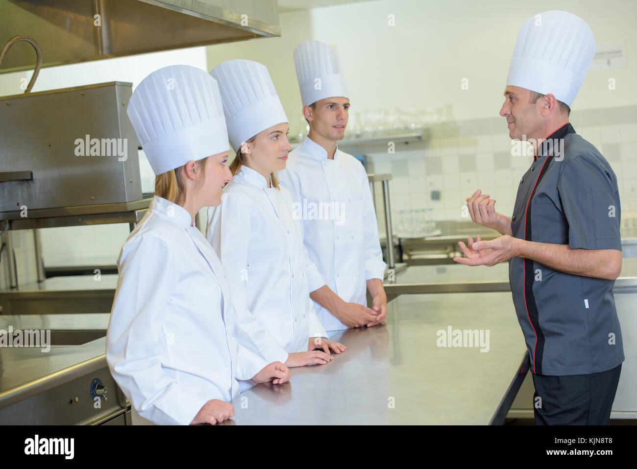 chef giving out explanation Stock Photo - Alamy