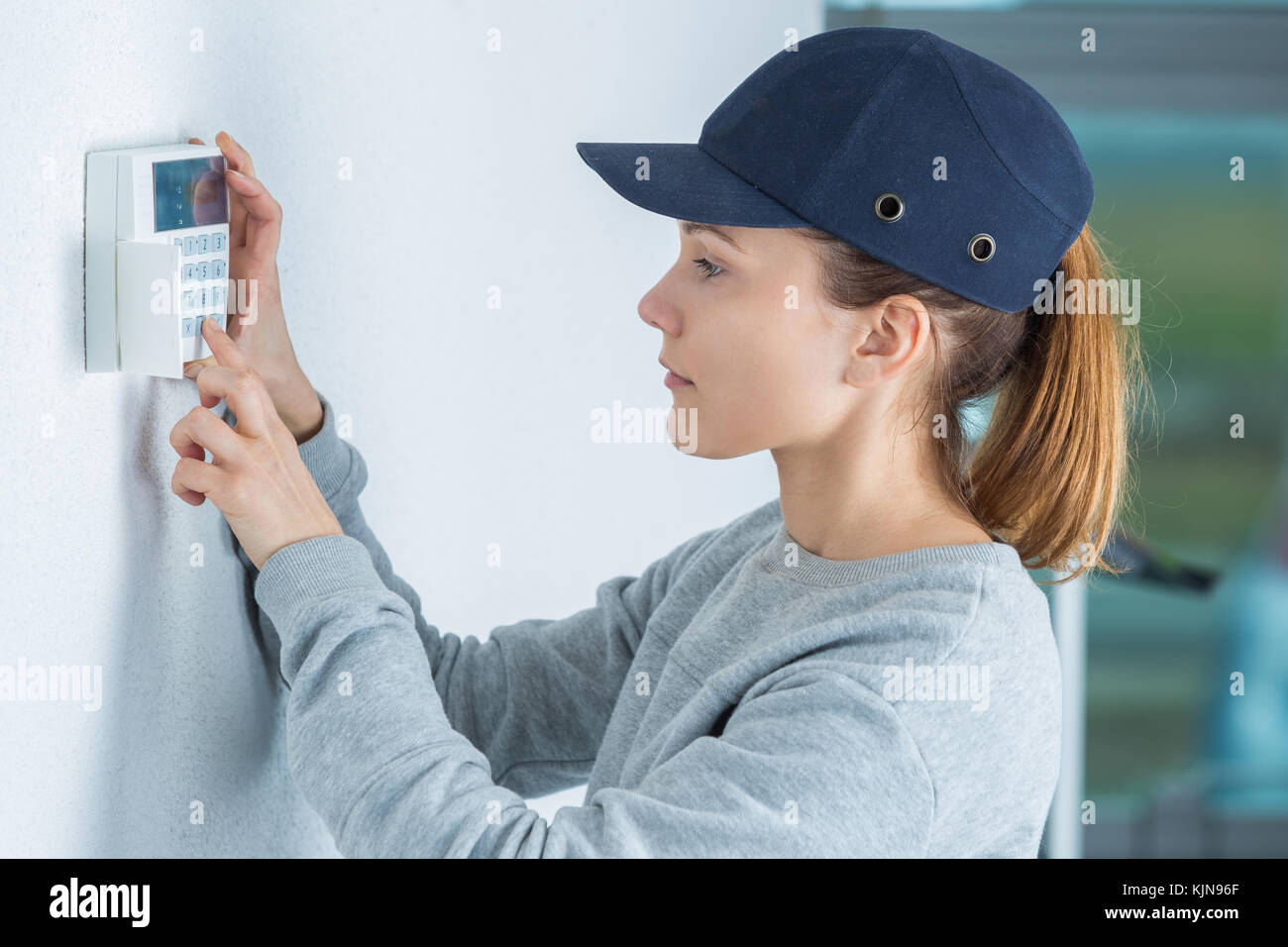 female electrician installing security system Stock Photo - Alamy female electrician installing security system Stock Photo - Alamy