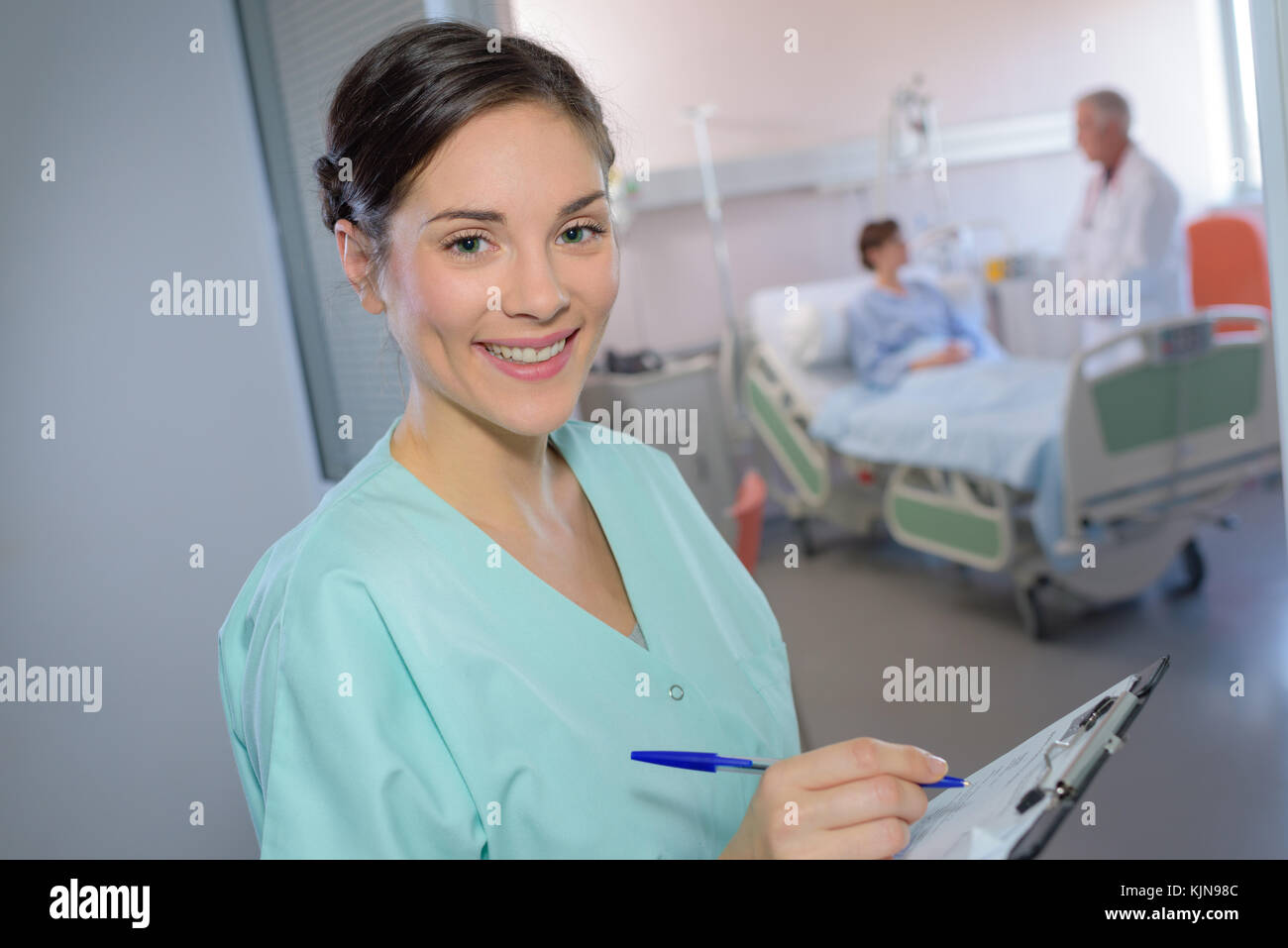 Portrait of nurse outside of hospital room Stock Photo - Alamy