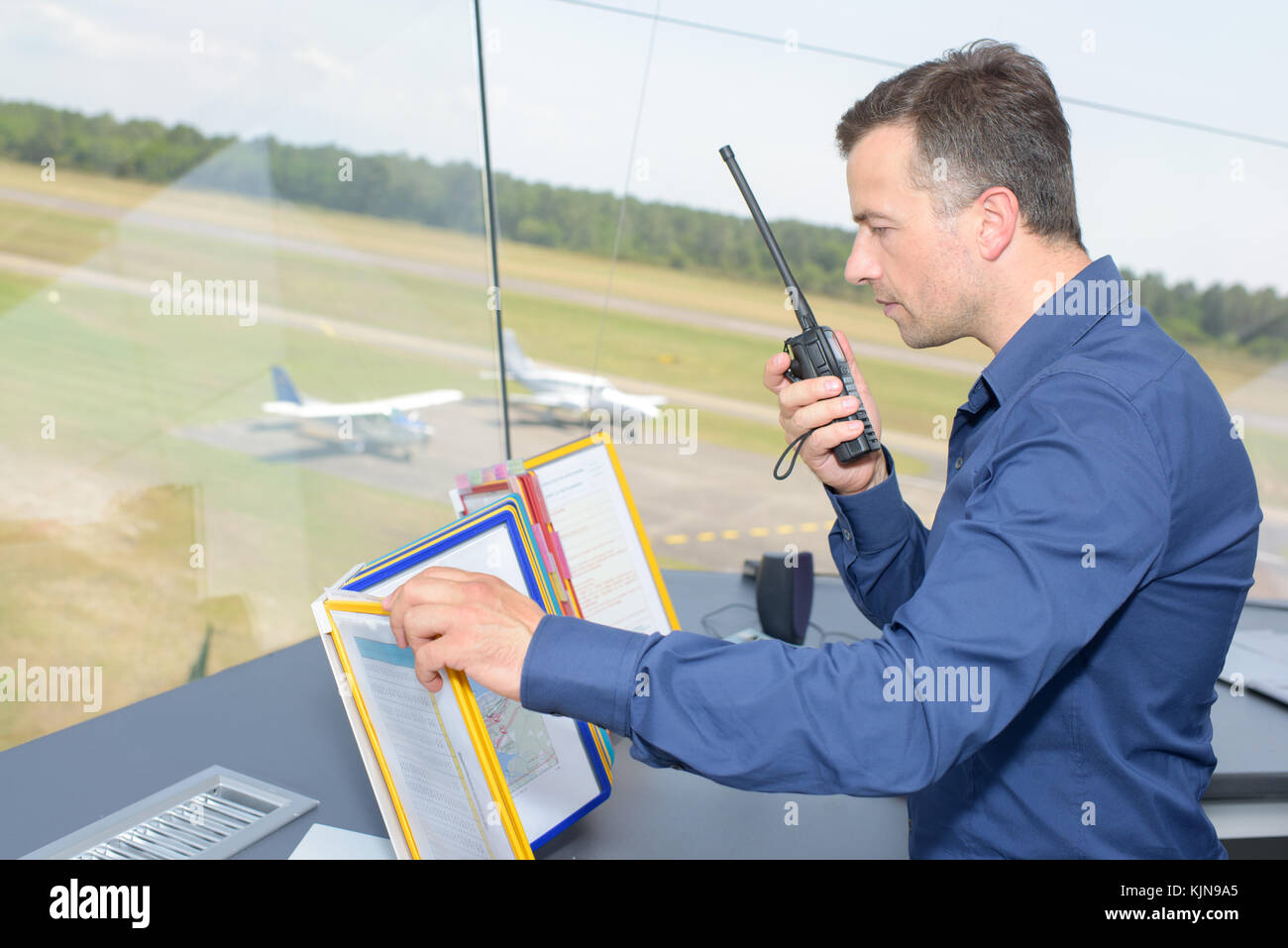 man in the airport tower Stock Photo - Alamy