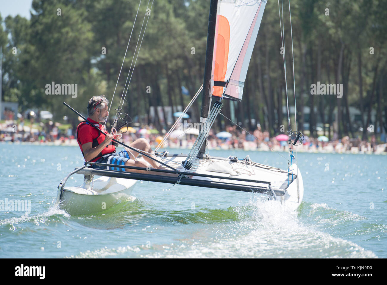 enjoying extreme sailing with racing sailboat Stock Photo - Alamy