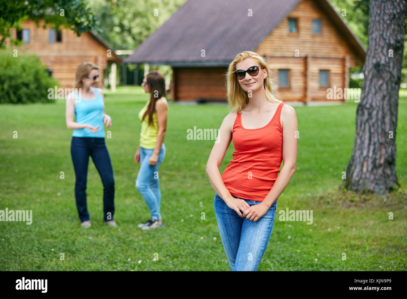 three girls having fun outdoors Stock Photo - Alamy