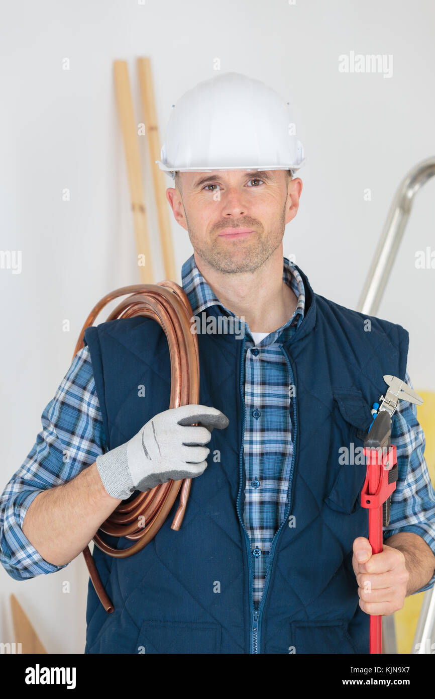 laborer posing with equipments Stock Photo - Alamy