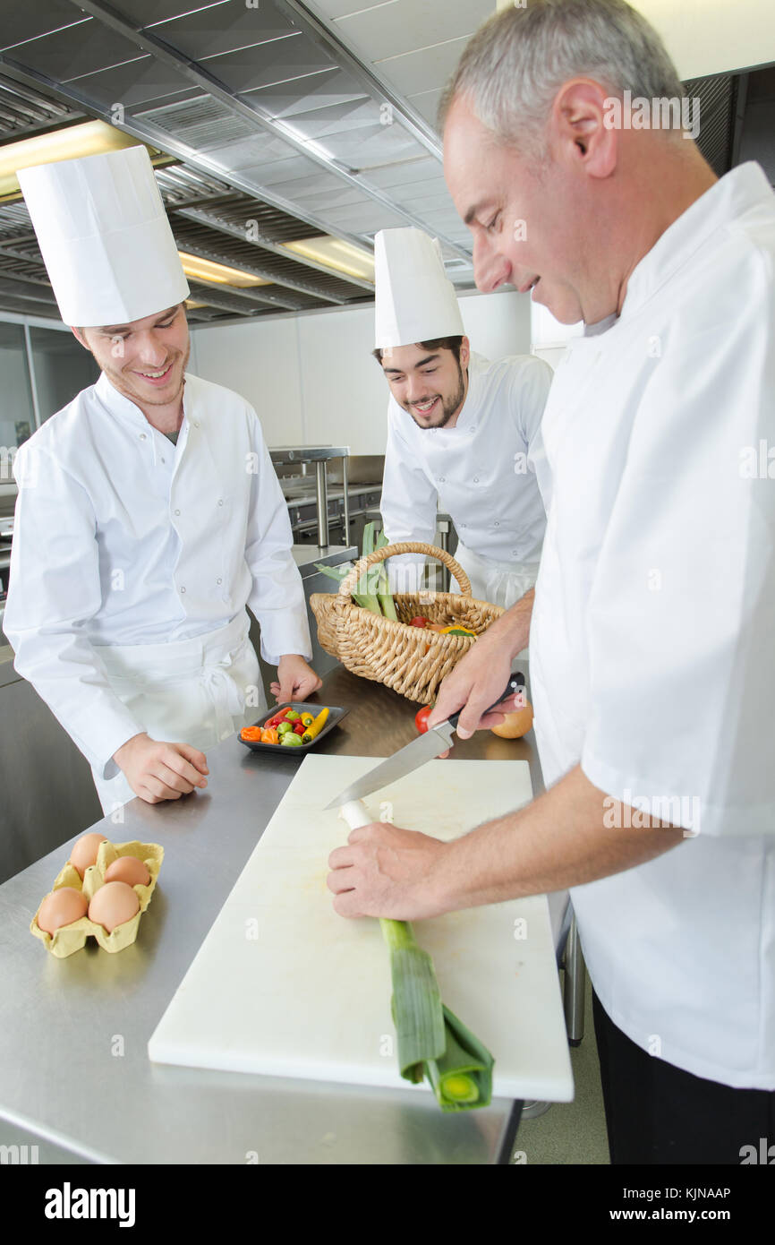 trainee chefs watching how to prepare leek Stock Photo - Alamy