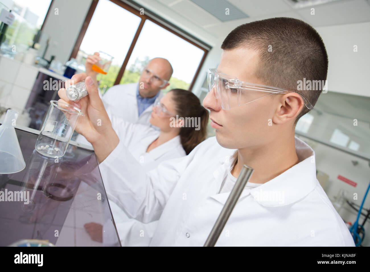 young researchers in science research project in laboratory Stock Photo ...