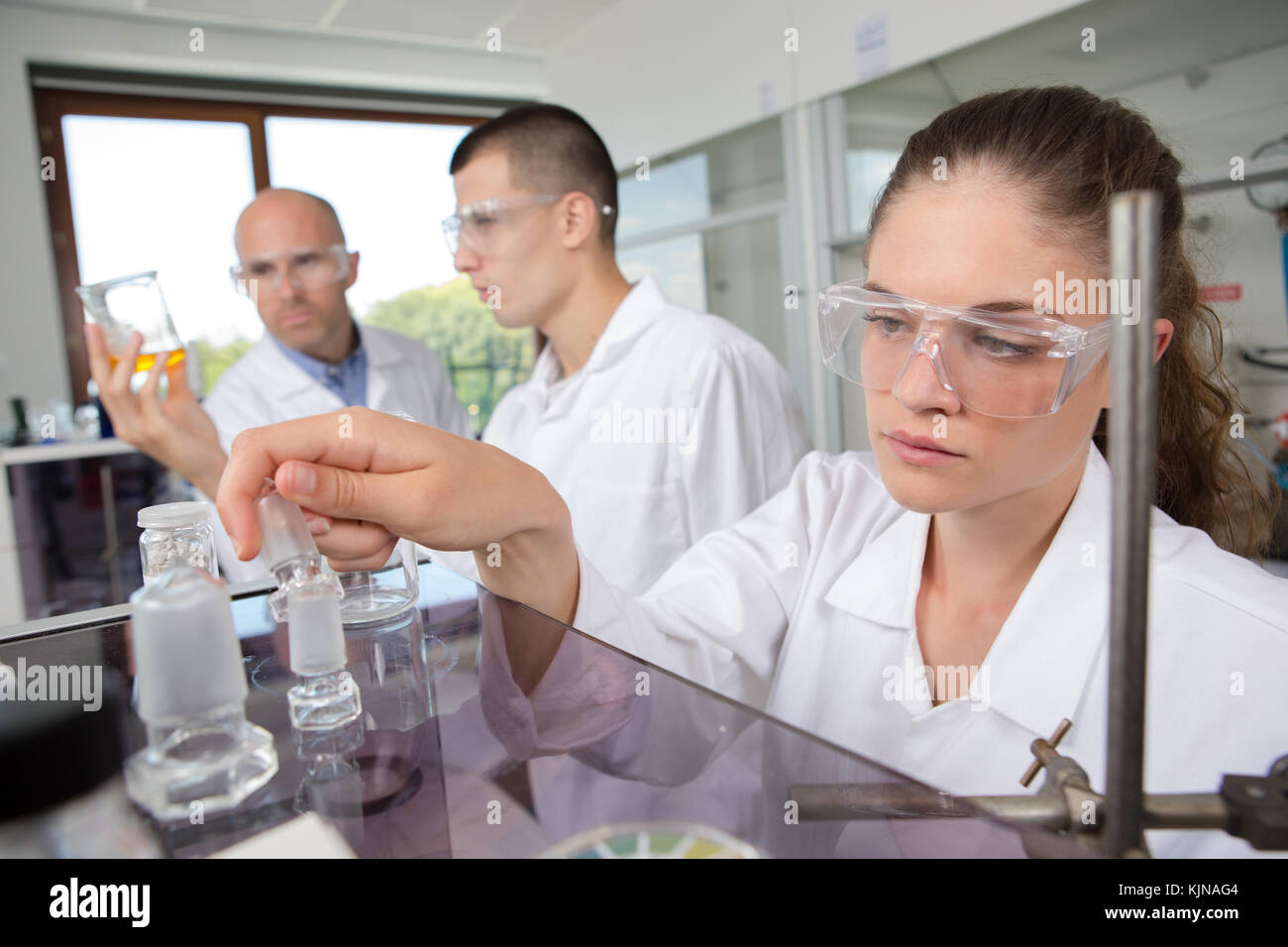 shot of three focused scientists working in their chemistry lab Stock ...