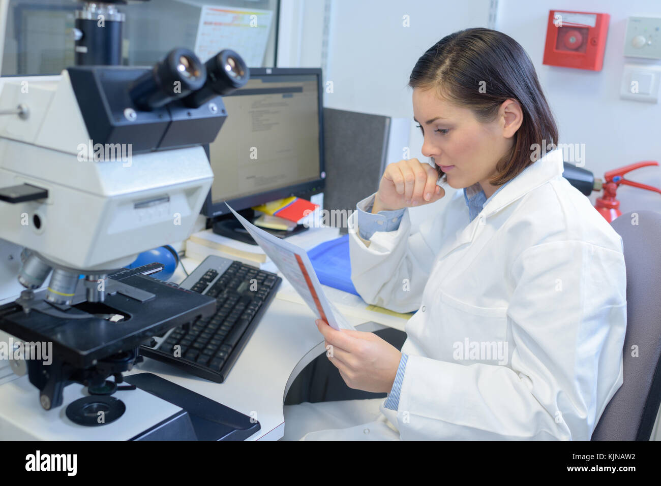 Reading patient notes hi-res stock photography and images - Alamy