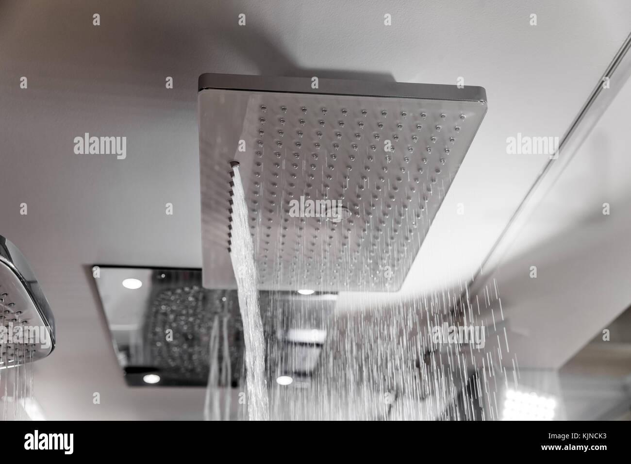 Modern shower with water drops in bath interior Stock Photo - Alamy