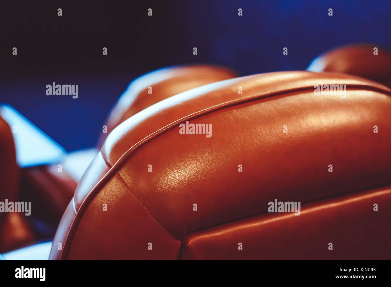 An empty theater with leather chairs. Rear view Stock Photo - Alamy