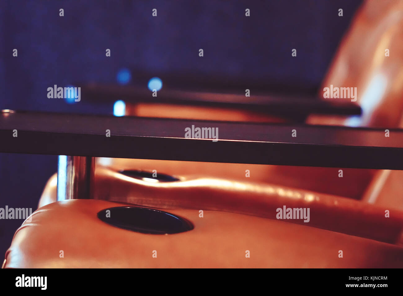 An empty theater with leather chairs. Rear view Stock Photo - Alamy