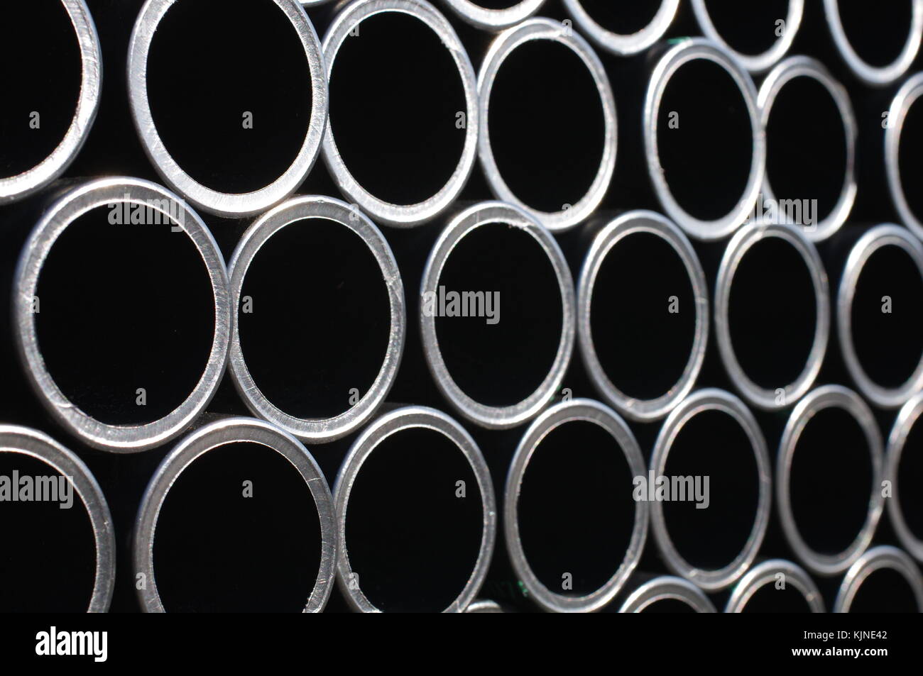 Pile out of pipes Stock Photo - Alamy