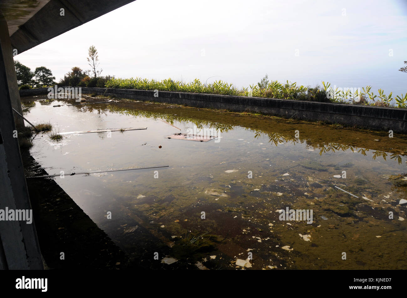 Balcony at abandoned hotel filled with rainwater Stock Photo - Alamy