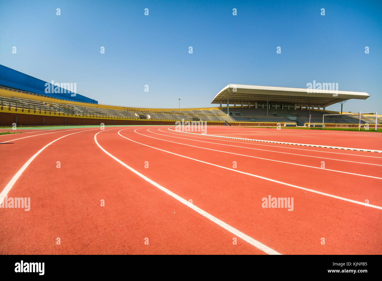 Running track in stadium Stock Photo - Alamy