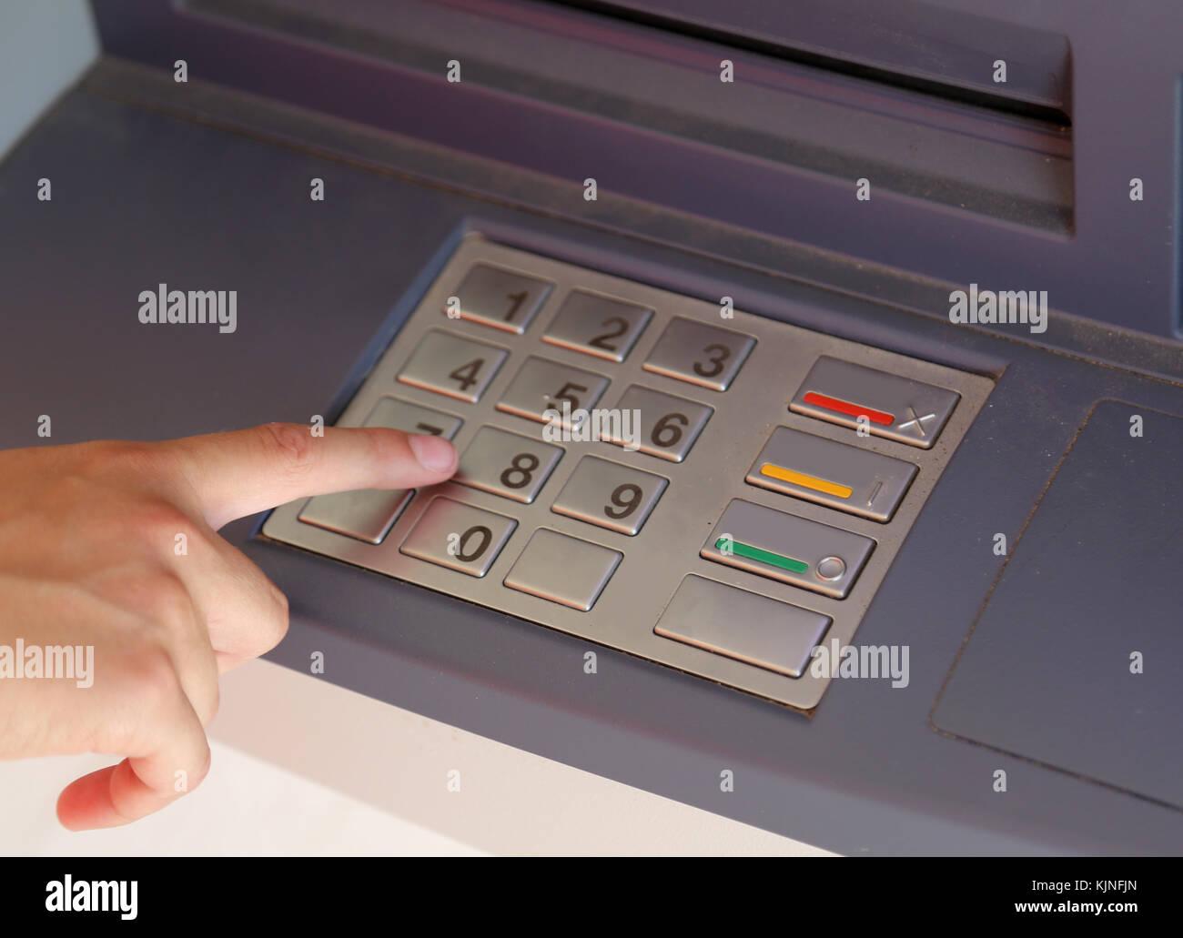 girl hand type the secret code in the keyboard of the ATM Stock Photo ...